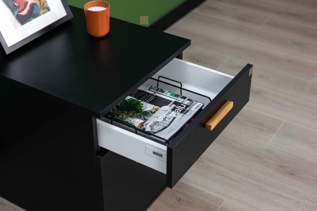 Black mobile container with drawer and shelf for binders